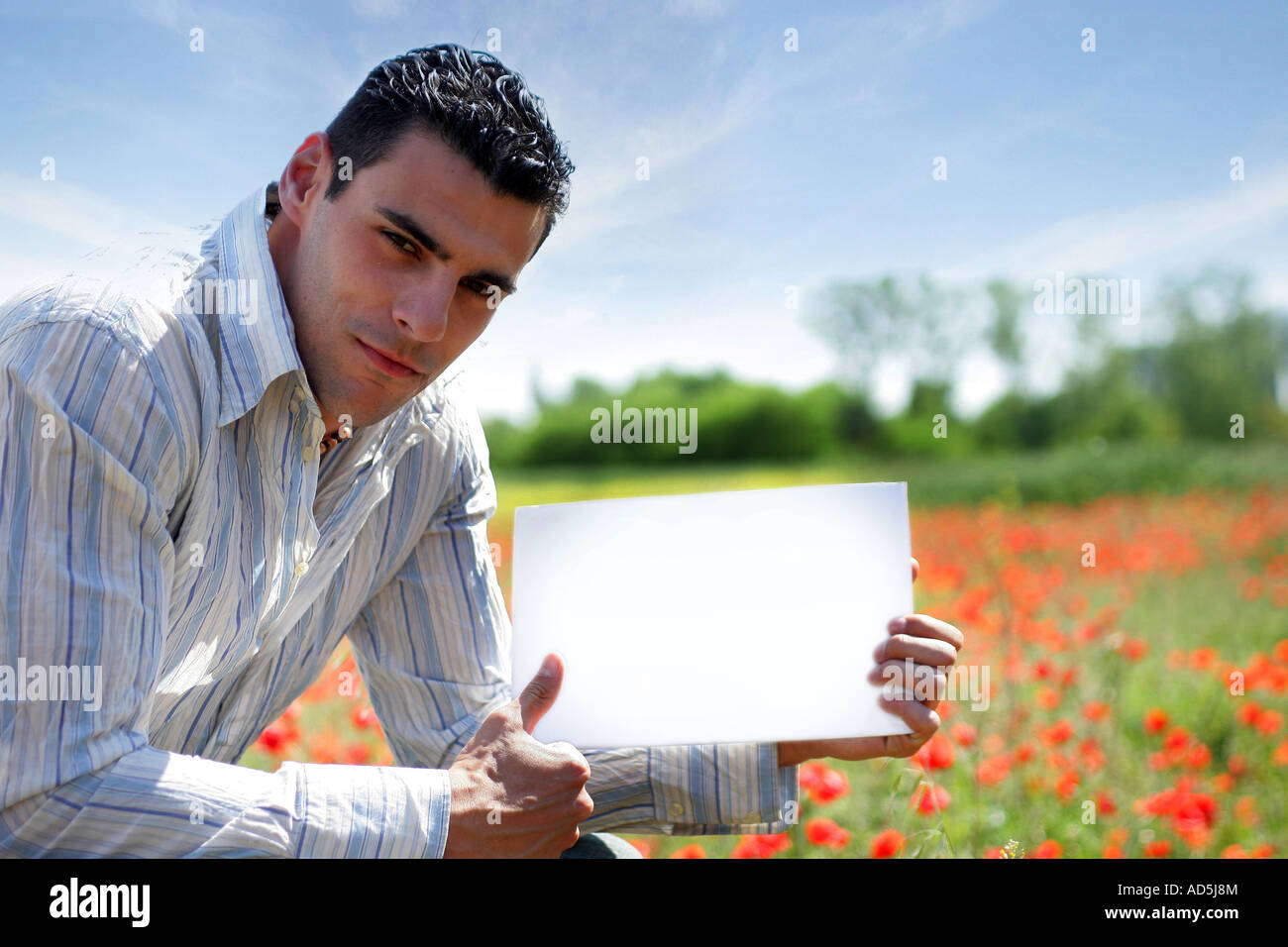 Man showing a display board Stock Photo - Alamy