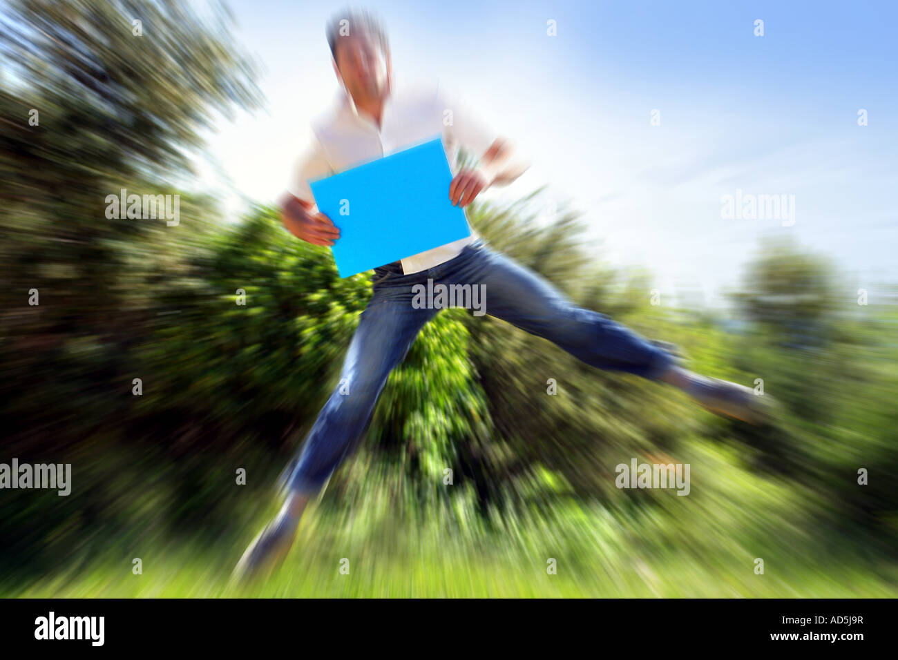 Man showing a blue display board Stock Photo - Alamy