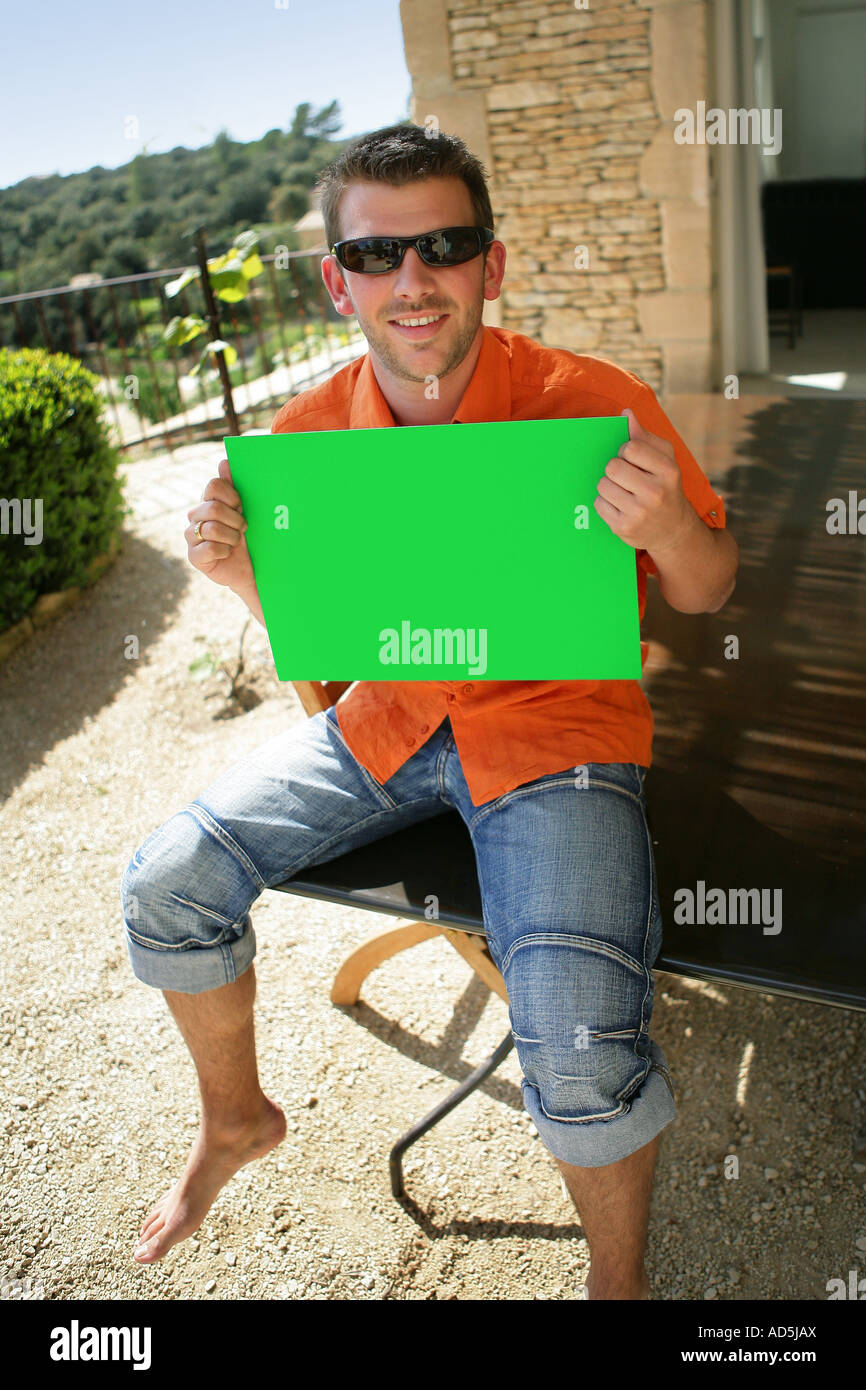Man showing a display board Stock Photo - Alamy