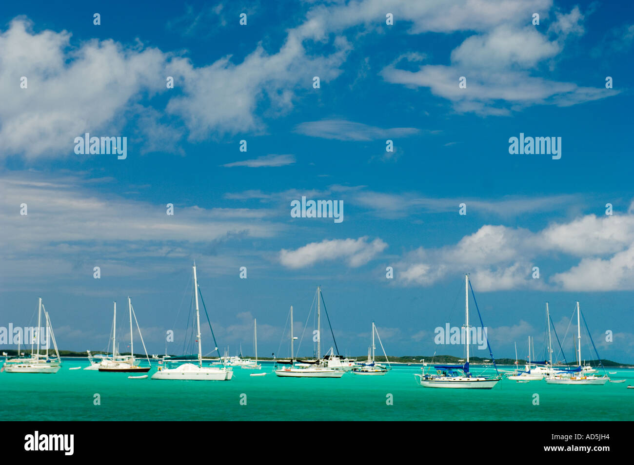 GREATER EXUMA BAHAMA GEORGE TOWN Sailboats and boats moored in emerald ...