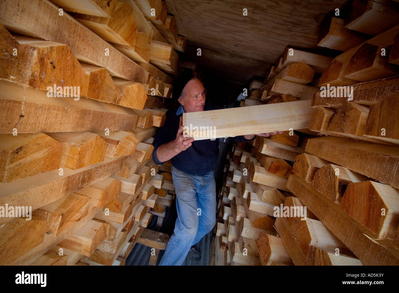 Newberry cricket bat factory in East Sussex. Willow is stacked in the ...