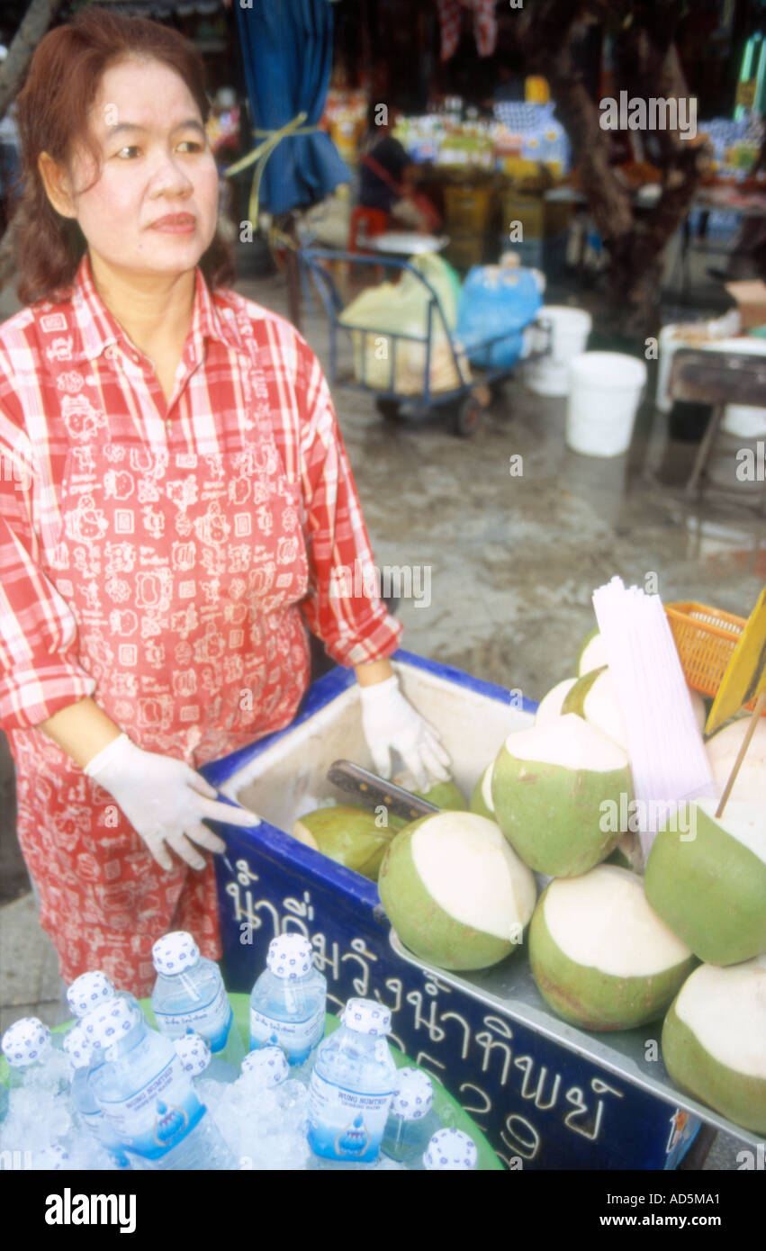 Woman selling goods at roadside stall Bangkok Thailand Stock Photo - Alamy