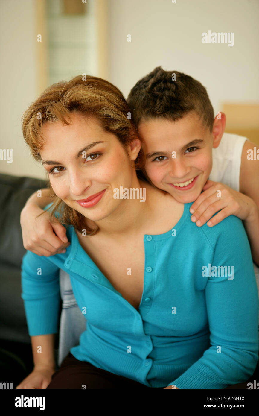Mother and son smiling Stock Photo - Alamy