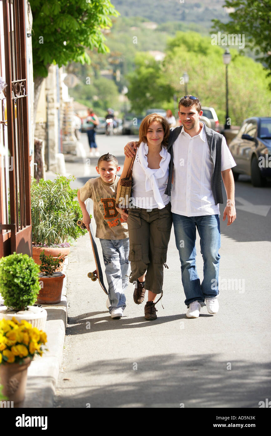 Family having a walk Stock Photo - Alamy