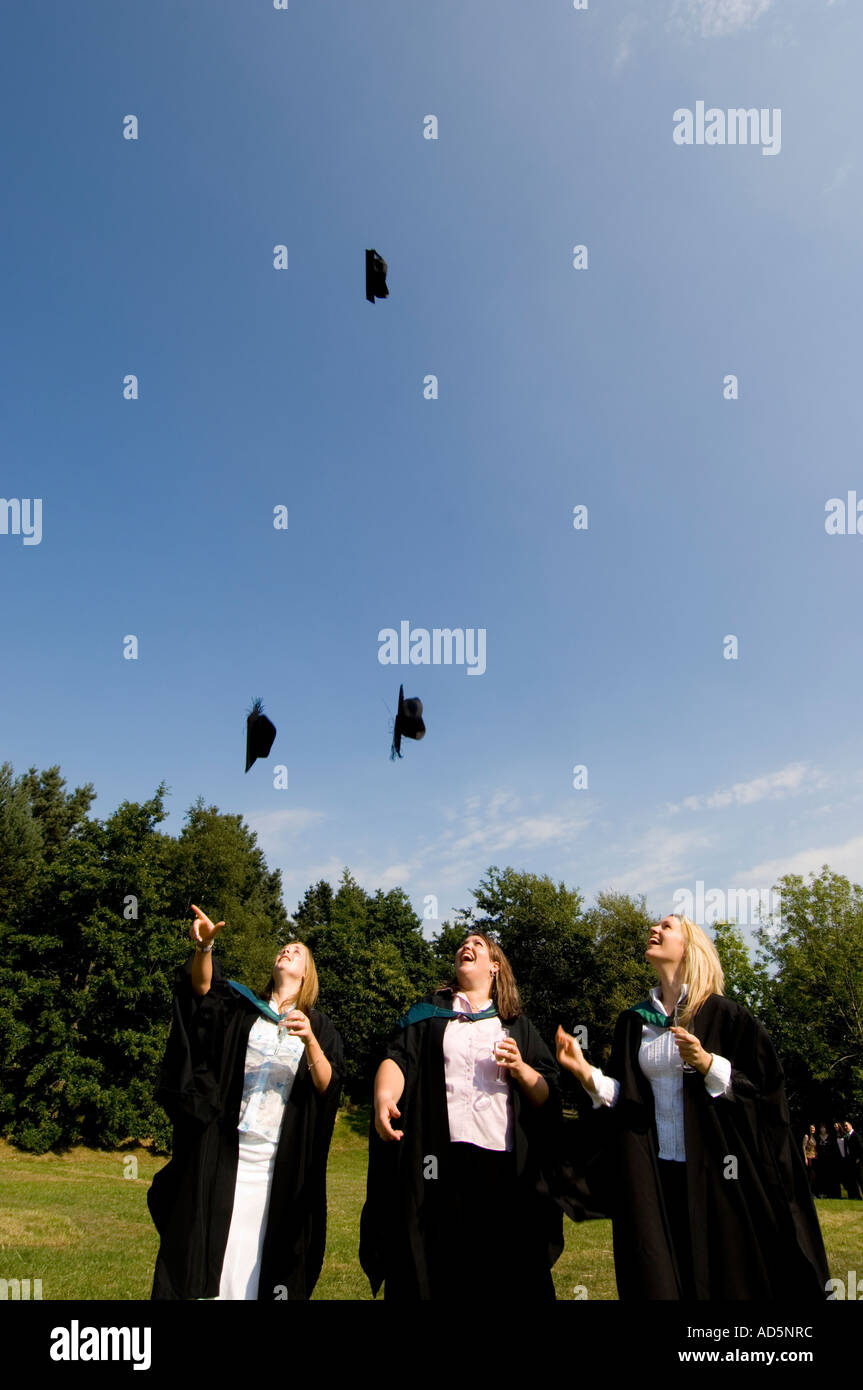 Uk graduates throwing caps hi-res stock photography and images - Alamy
