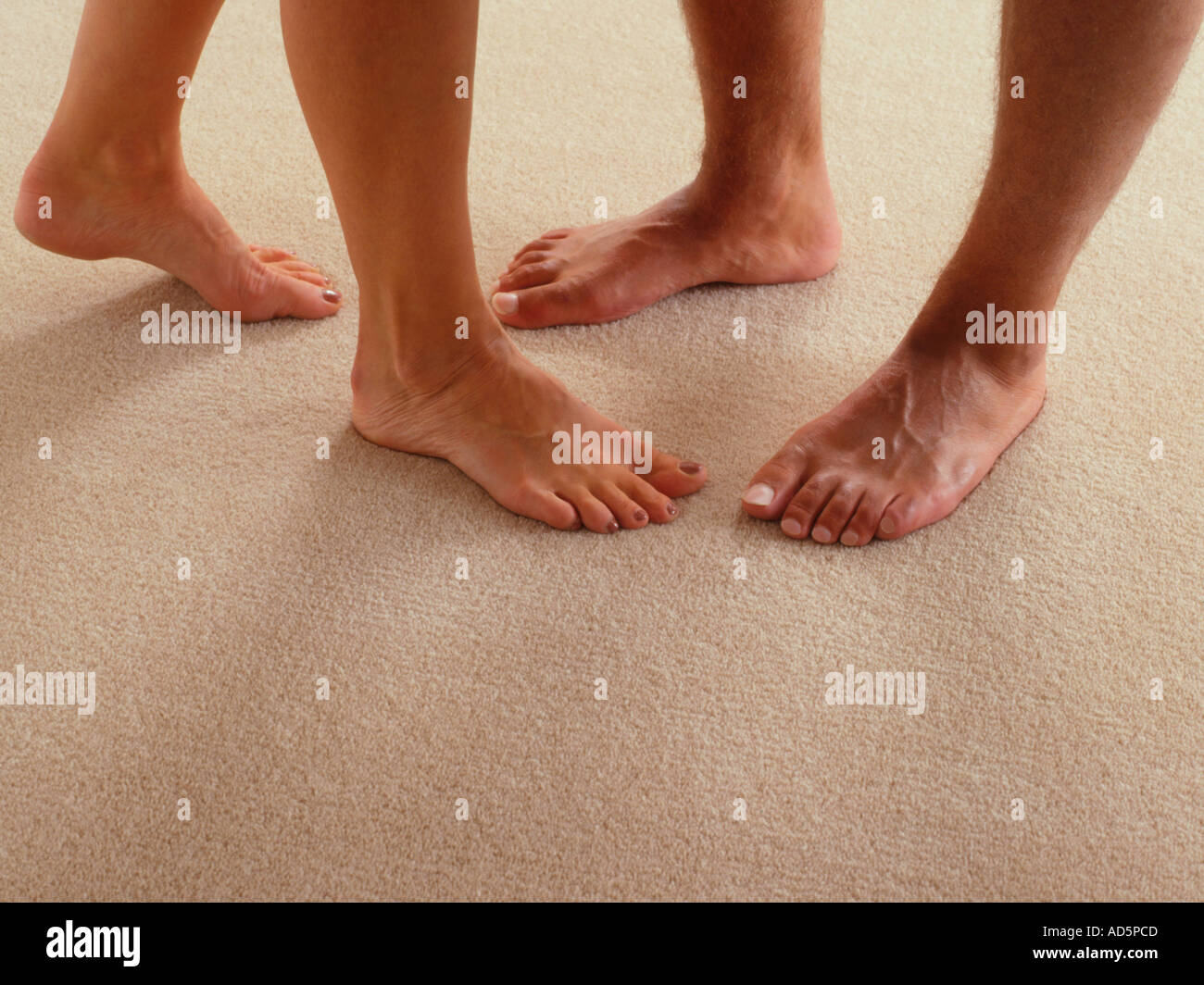 Couple bare feet Stock Photo - Alamy
