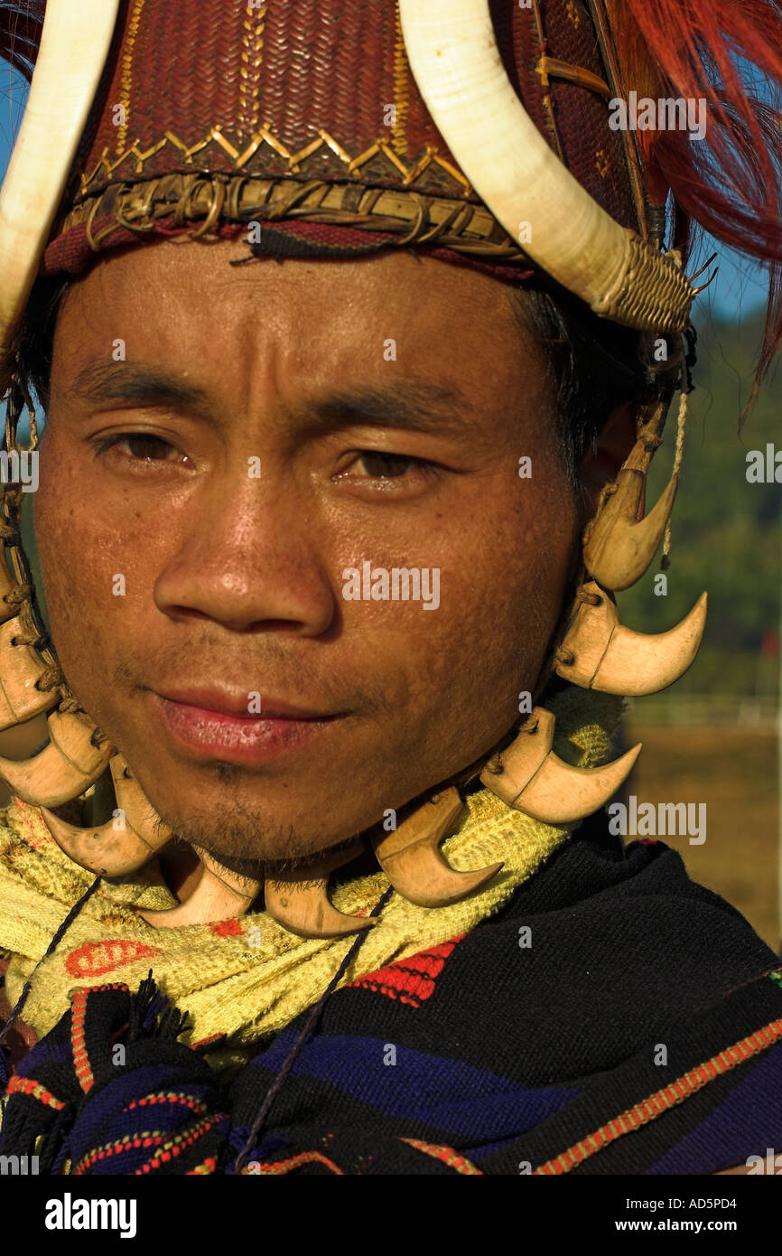 MYANMAR BURMA Naga man wearing headdress decorated with wild boar teeth ...