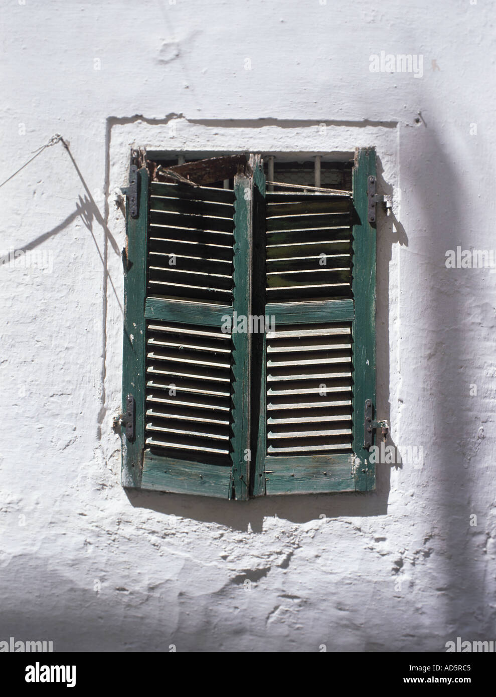 Run down rundown building shutter corfu hi-res stock photography and ...