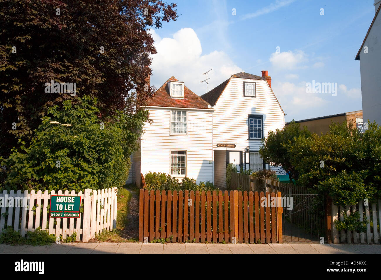 Whitstable white board houses Stock Photo - Alamy