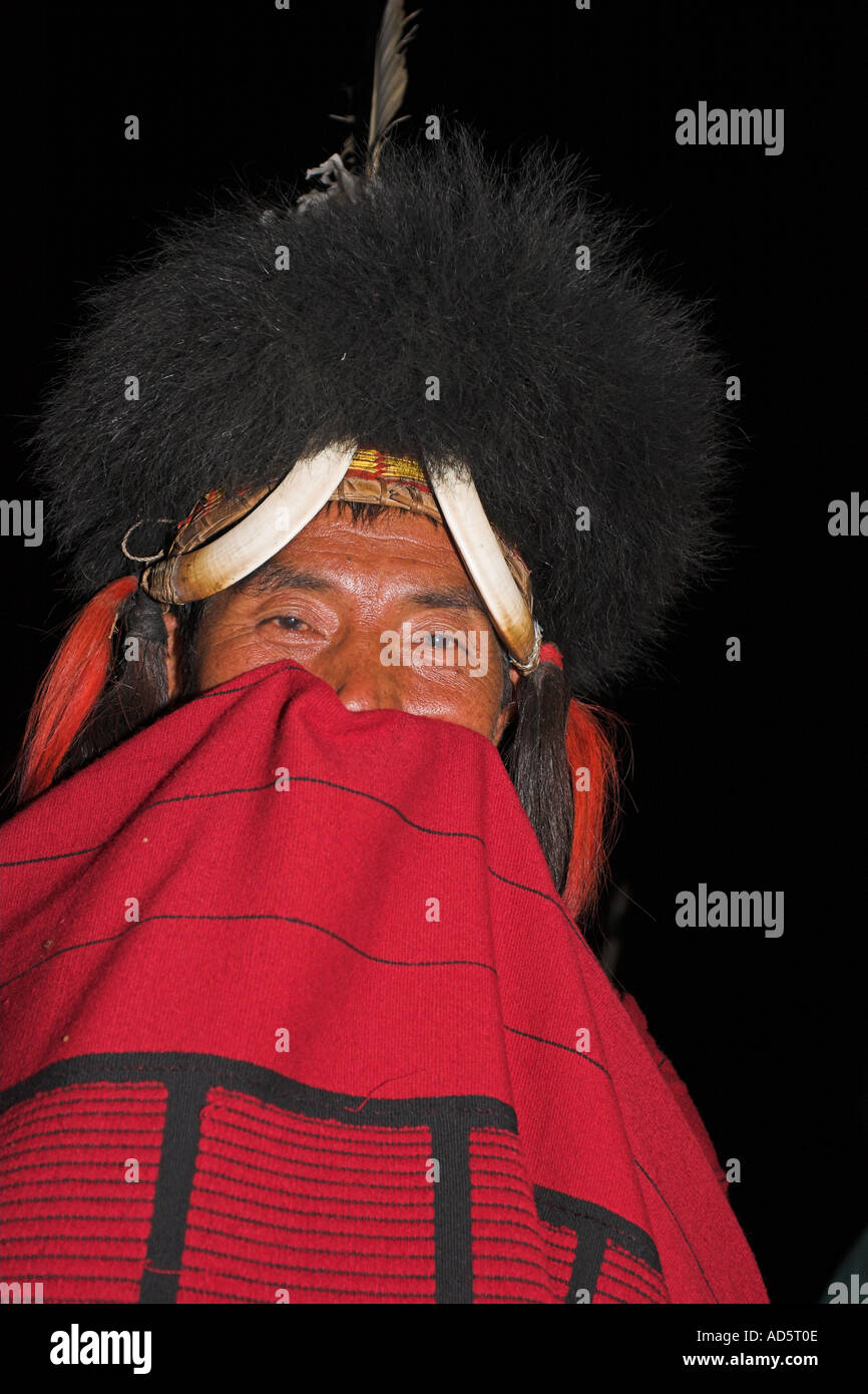 MYANMAR BURMA Naga man wrapped up in traditional blanket wearing ...