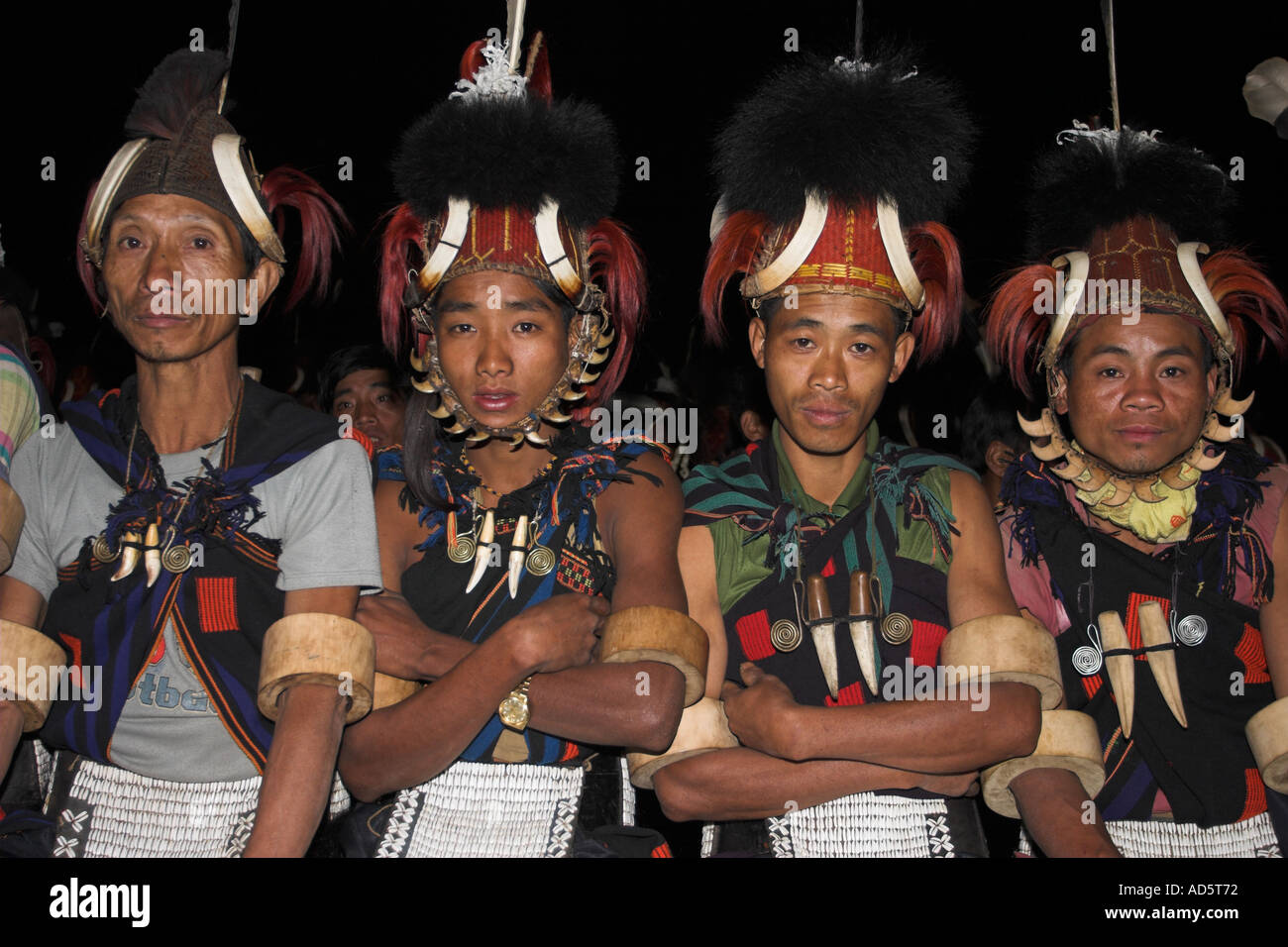 MYANMAR BURMA Naga men wearing headdress decorated with wild boar teeth ...