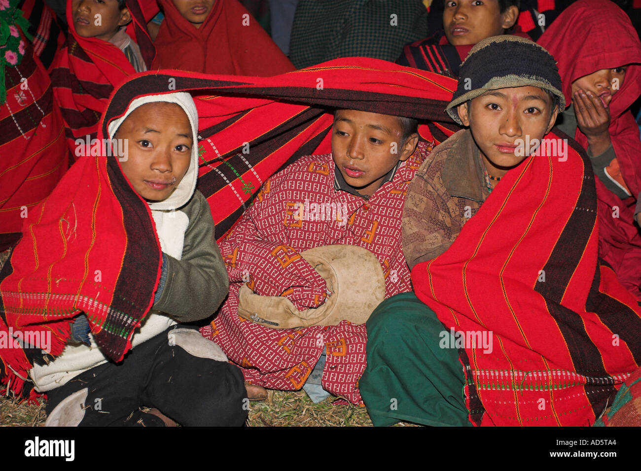 MYANMAR BURMA Naga New Year Festival Naga children wrapped up in ...