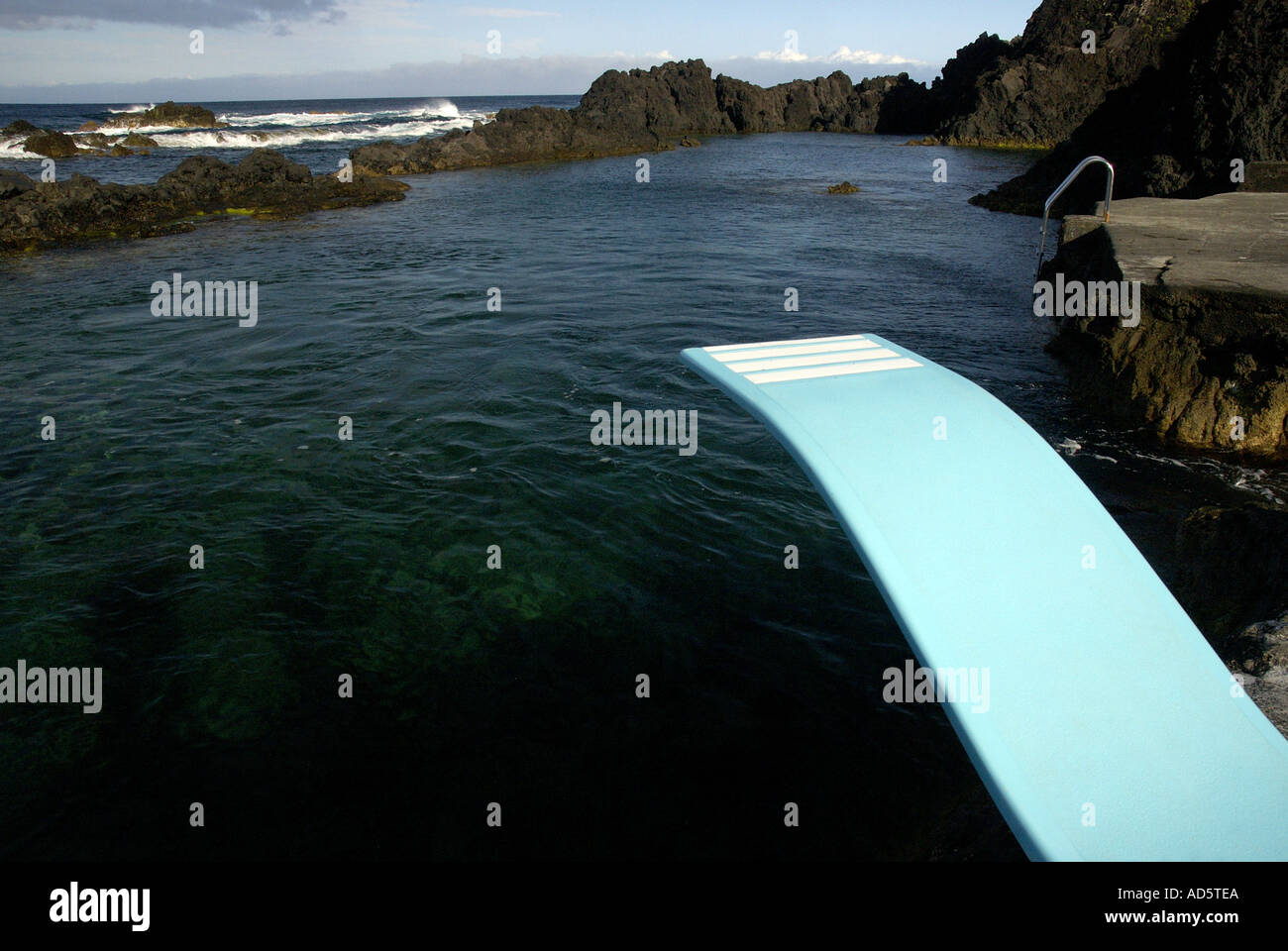 Diving board into huge rock pool Santa Cruz Flores island Azores Stock ...