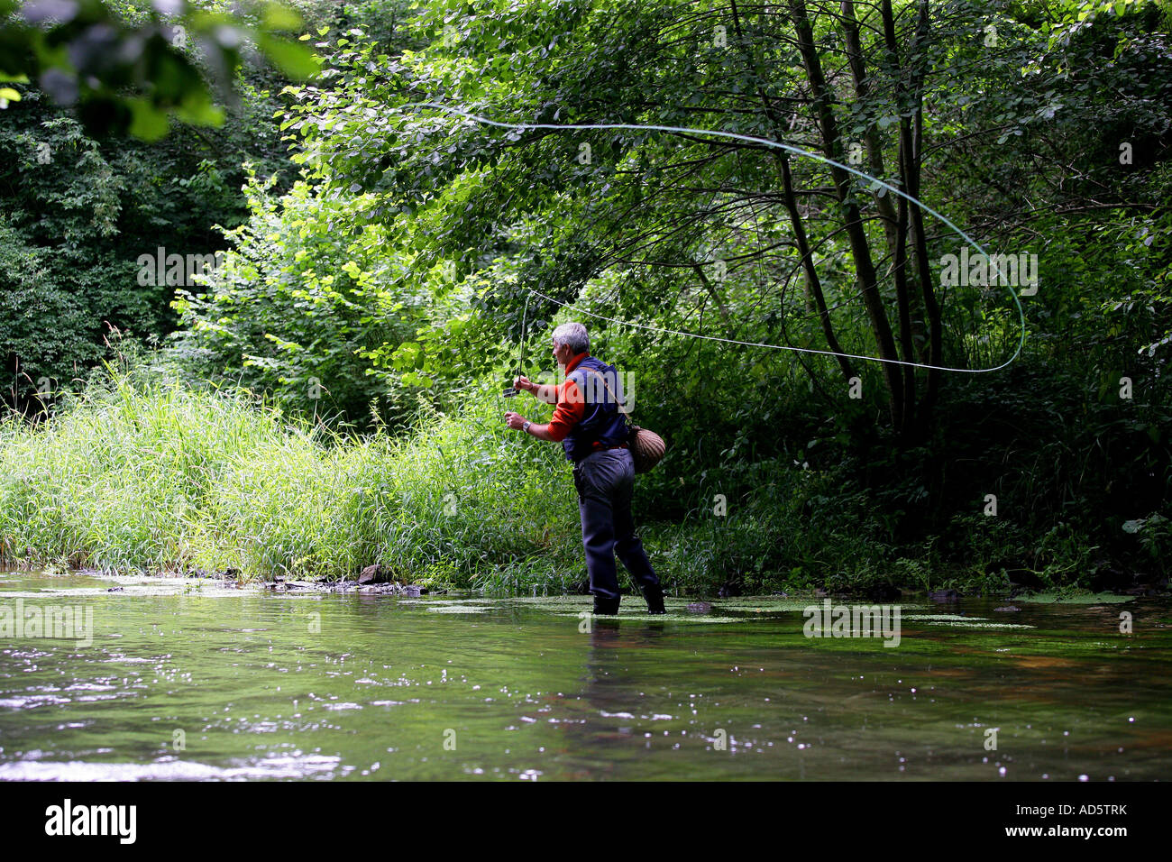 Fisher man in river Stock Photo - Alamy