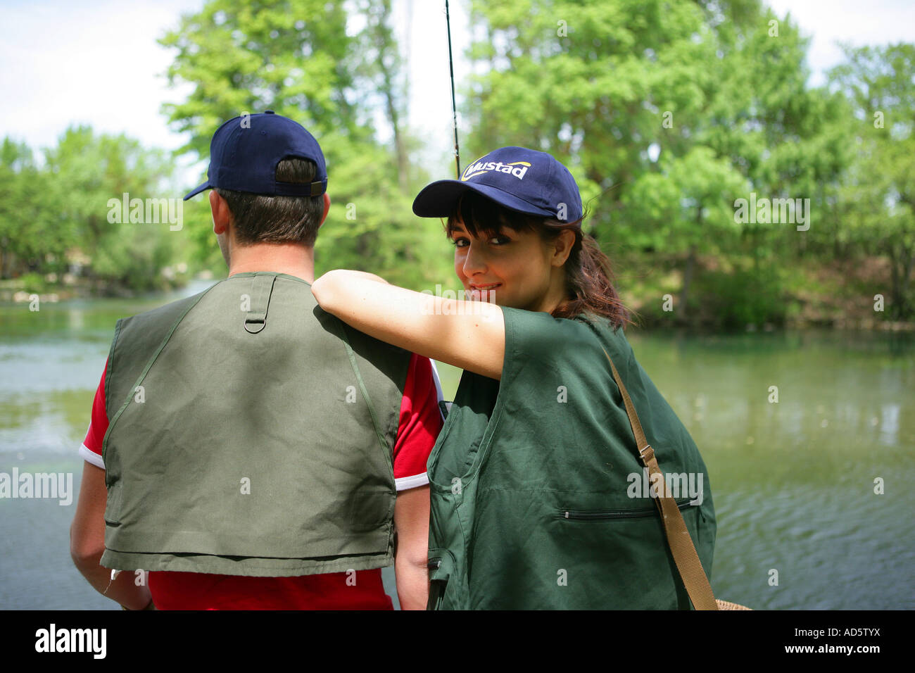 Young couple fishing Stock Photo - Alamy