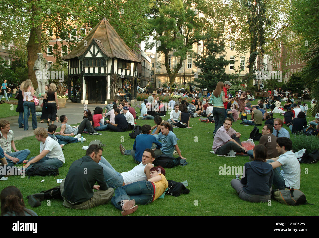 Crowds after work relaxing in Soho square, central London. UK Stock ...