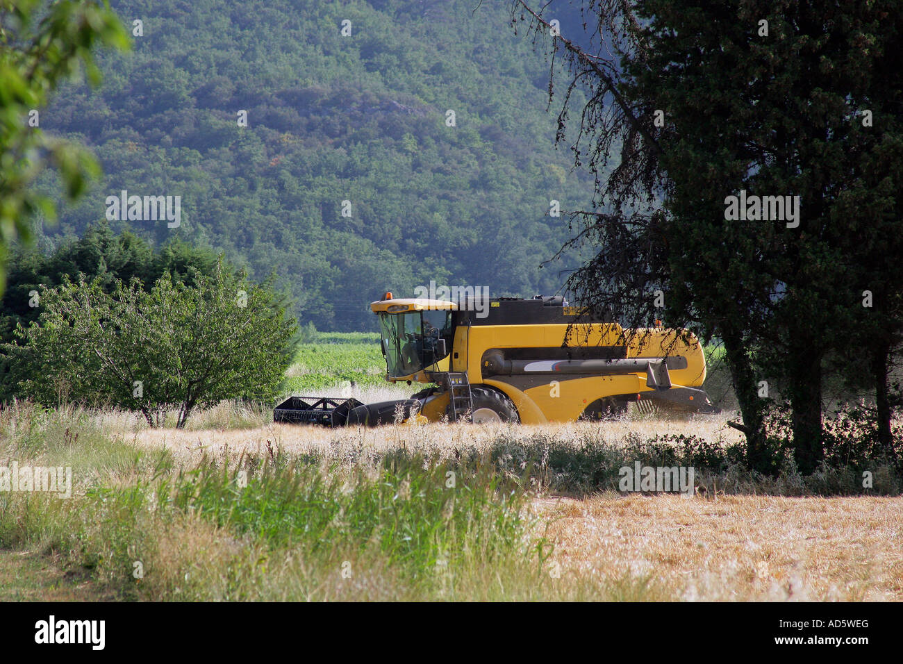 Farm machines in a field Stock Photo - Alamy
