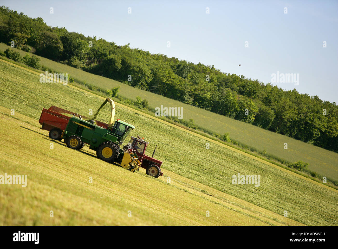 Farm machines in a field Stock Photo - Alamy