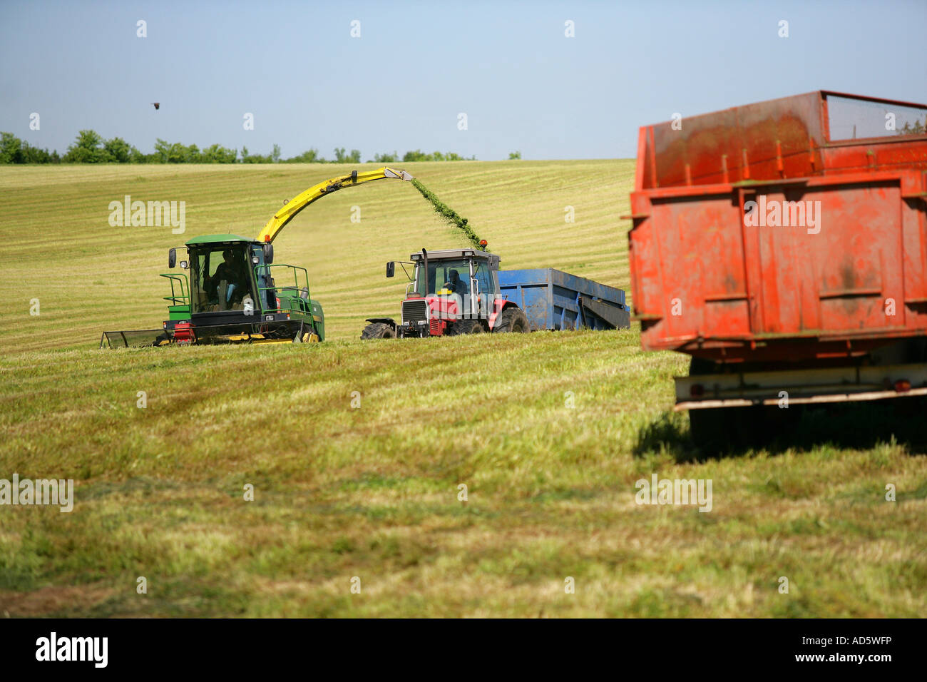 Farm machines in a field Stock Photo - Alamy