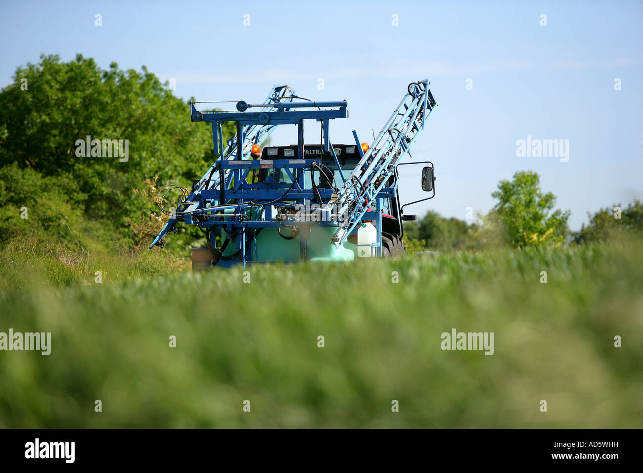 Farm machines in a field Stock Photo - Alamy