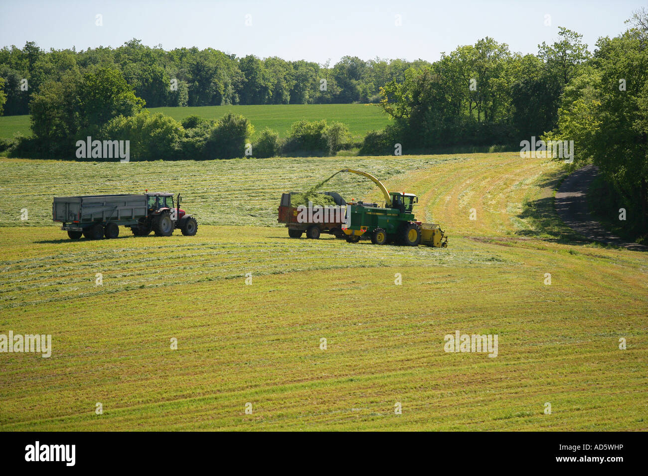 Farm machines in a field Stock Photo - Alamy