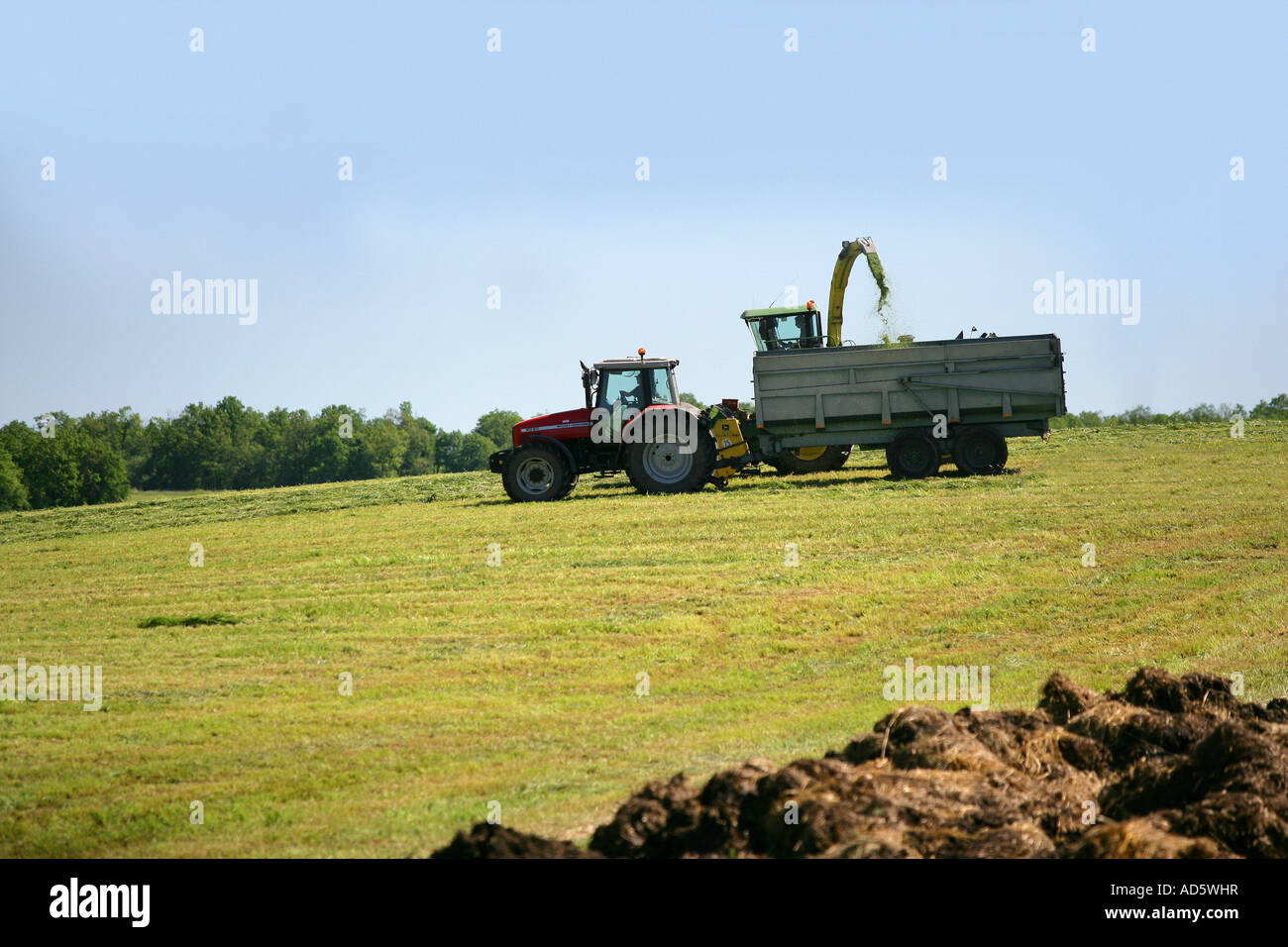 Farm machines in a field Stock Photo - Alamy