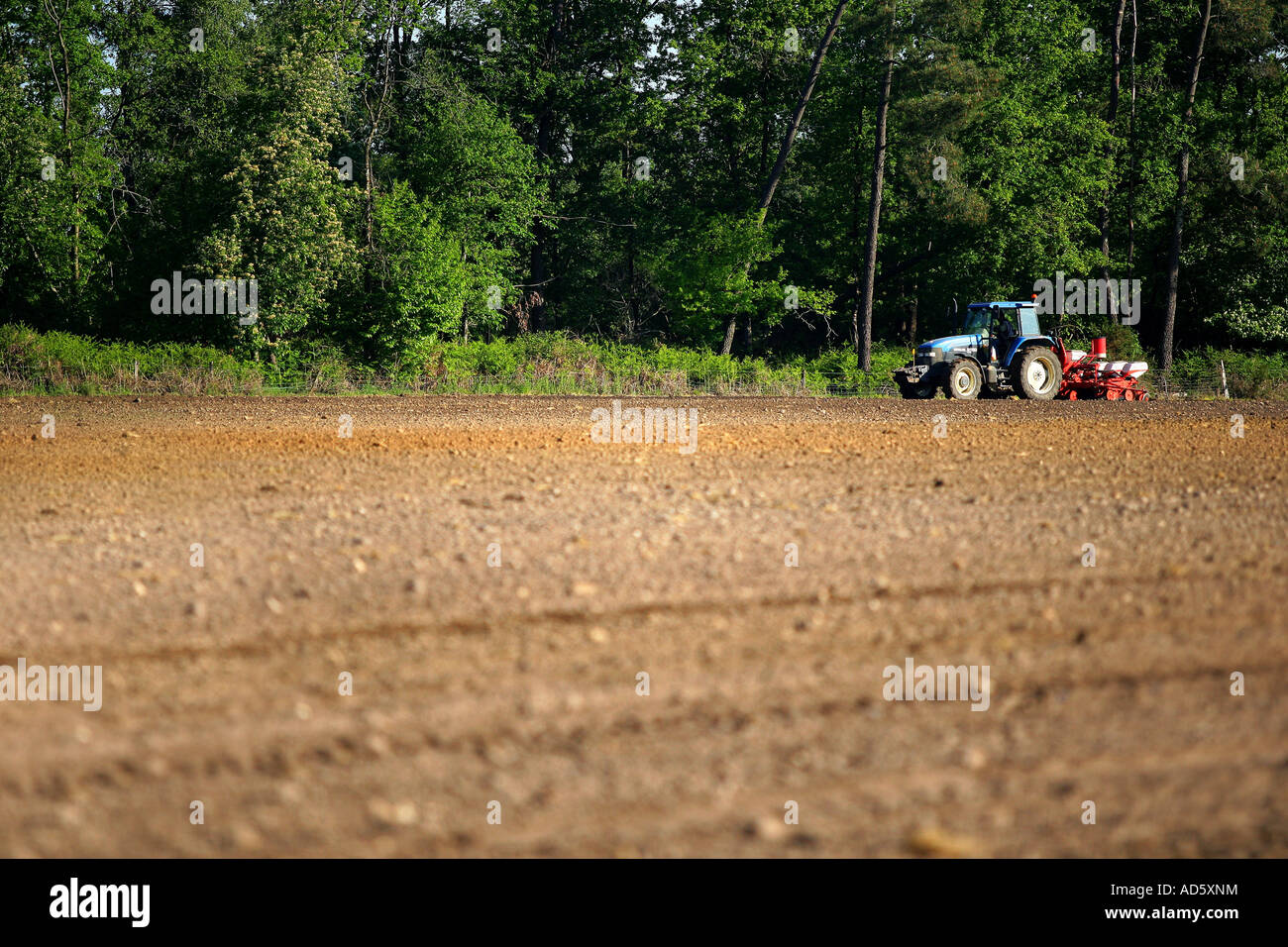 Farm machine in a field Stock Photo - Alamy