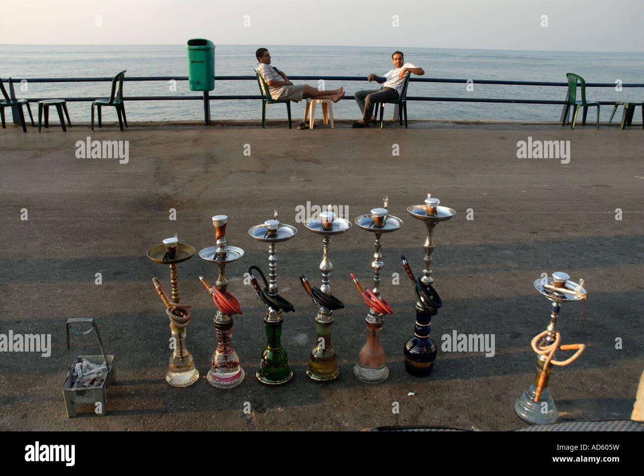 Beirut, Lebanon.2006 July. Corniche at sunset . Hookahs for hire Stock ...