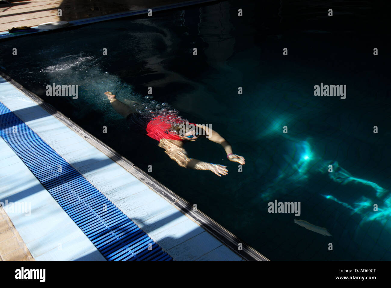 Long distance swimmer practising in swimming pool Damscus Syria Stock ...