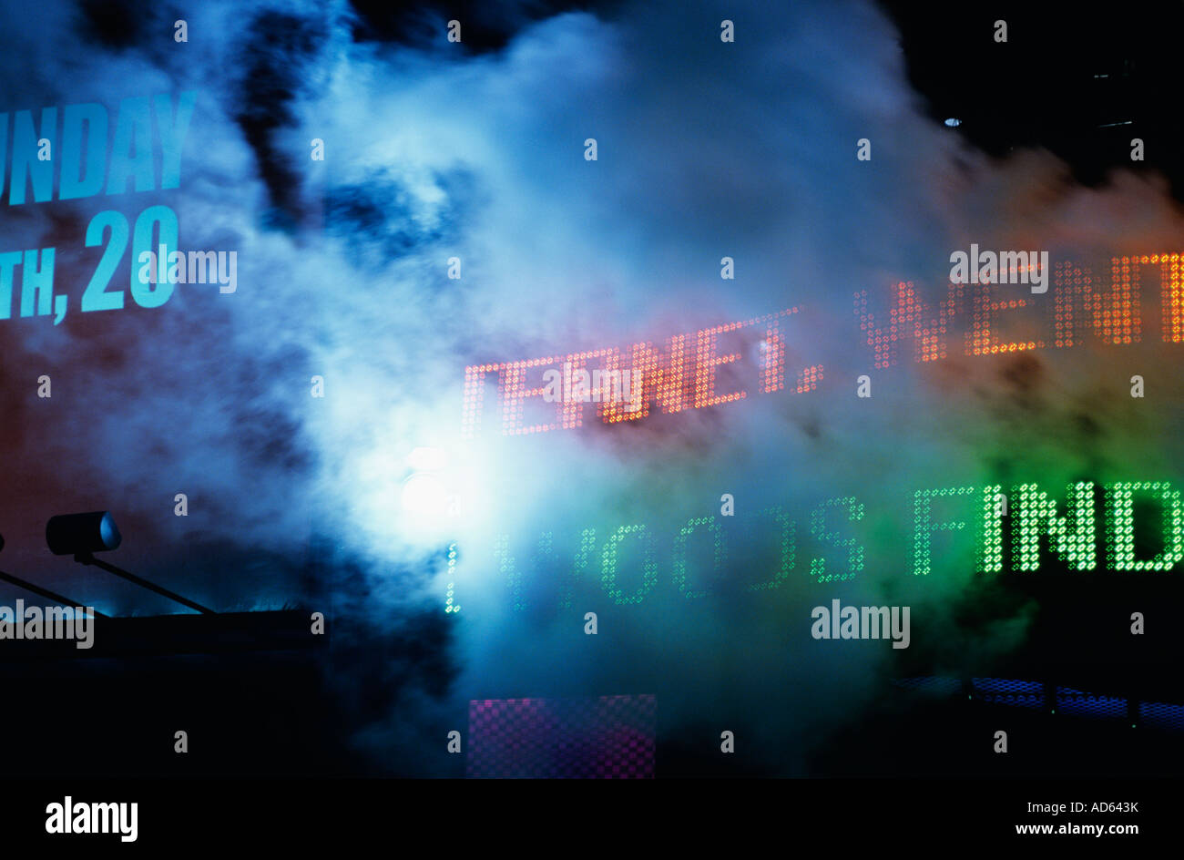 Neon signs on Times Square with smoke/fog Stock Photo - Alamy