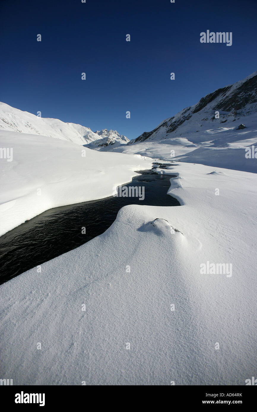 emerging water on a huge area of pure snow Stock Photo - Alamy