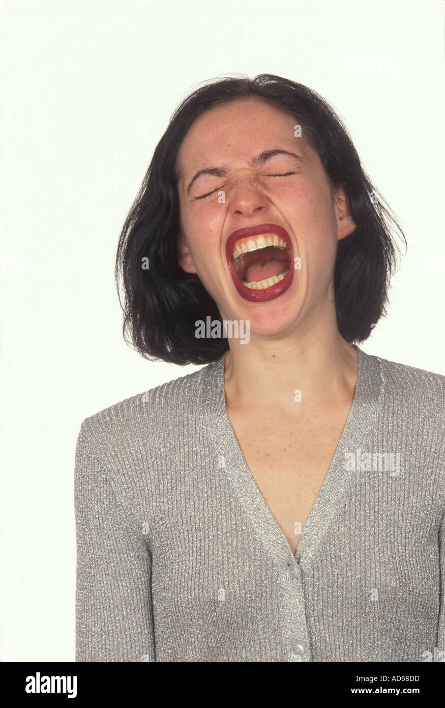 Woman in pain screaming Stock Photo - Alamy
