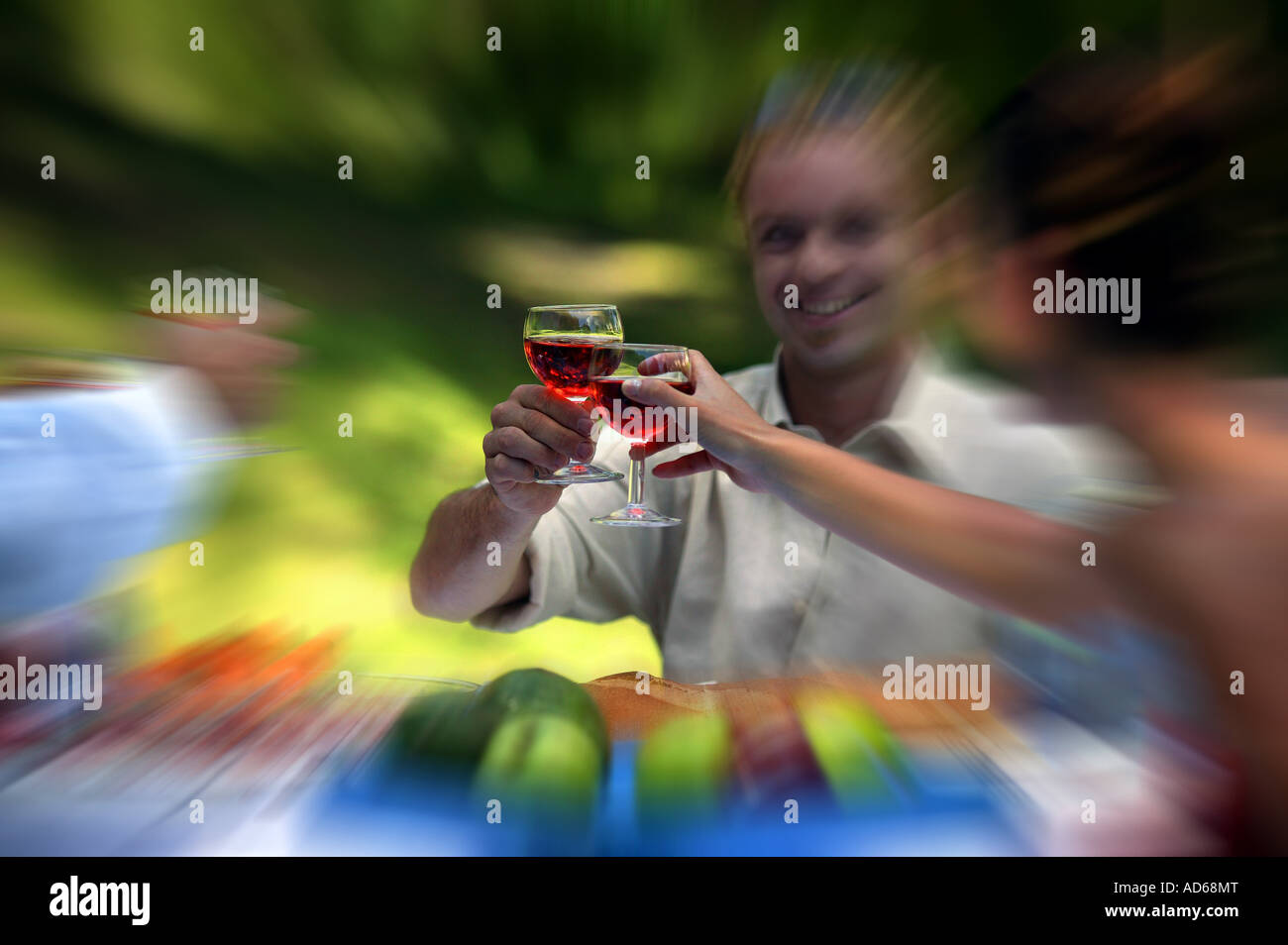 friends meal, chinking glasses Stock Photo - Alamy