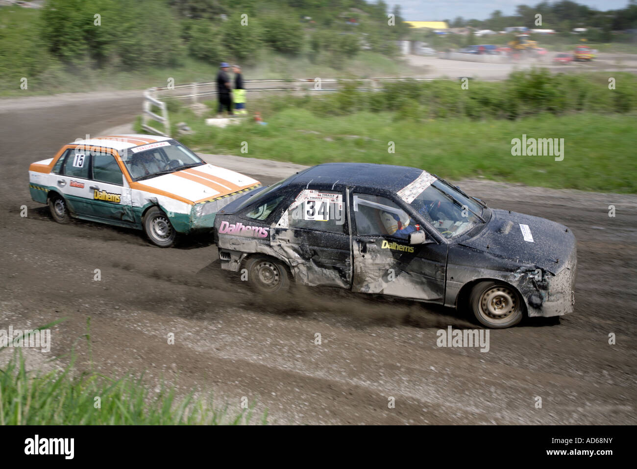 Folkrace banger racing Cars taking a curve racing through countryside ...