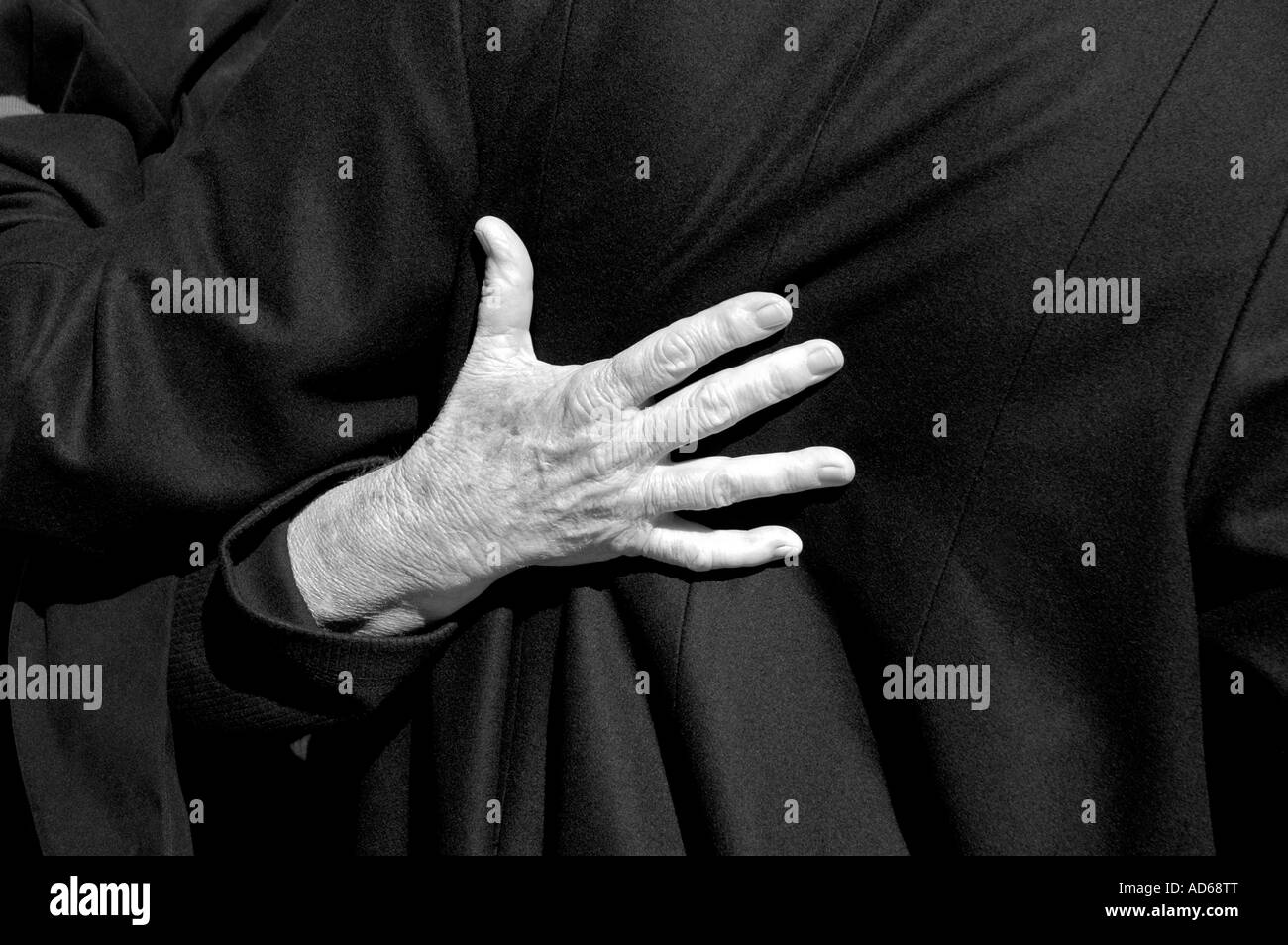 woman's hand on another woman's back Stock Photo - Alamy