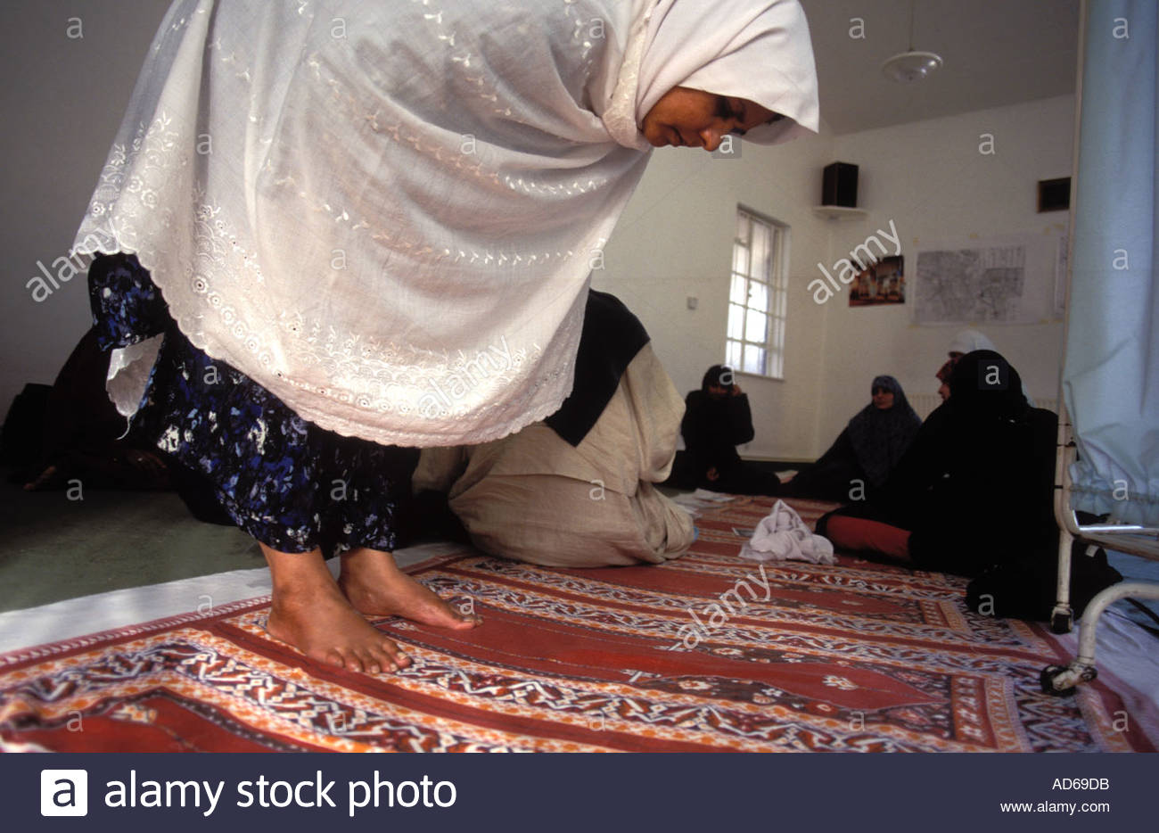 Muslim women praying in small mosque North London Stock Photo: 879067 ...