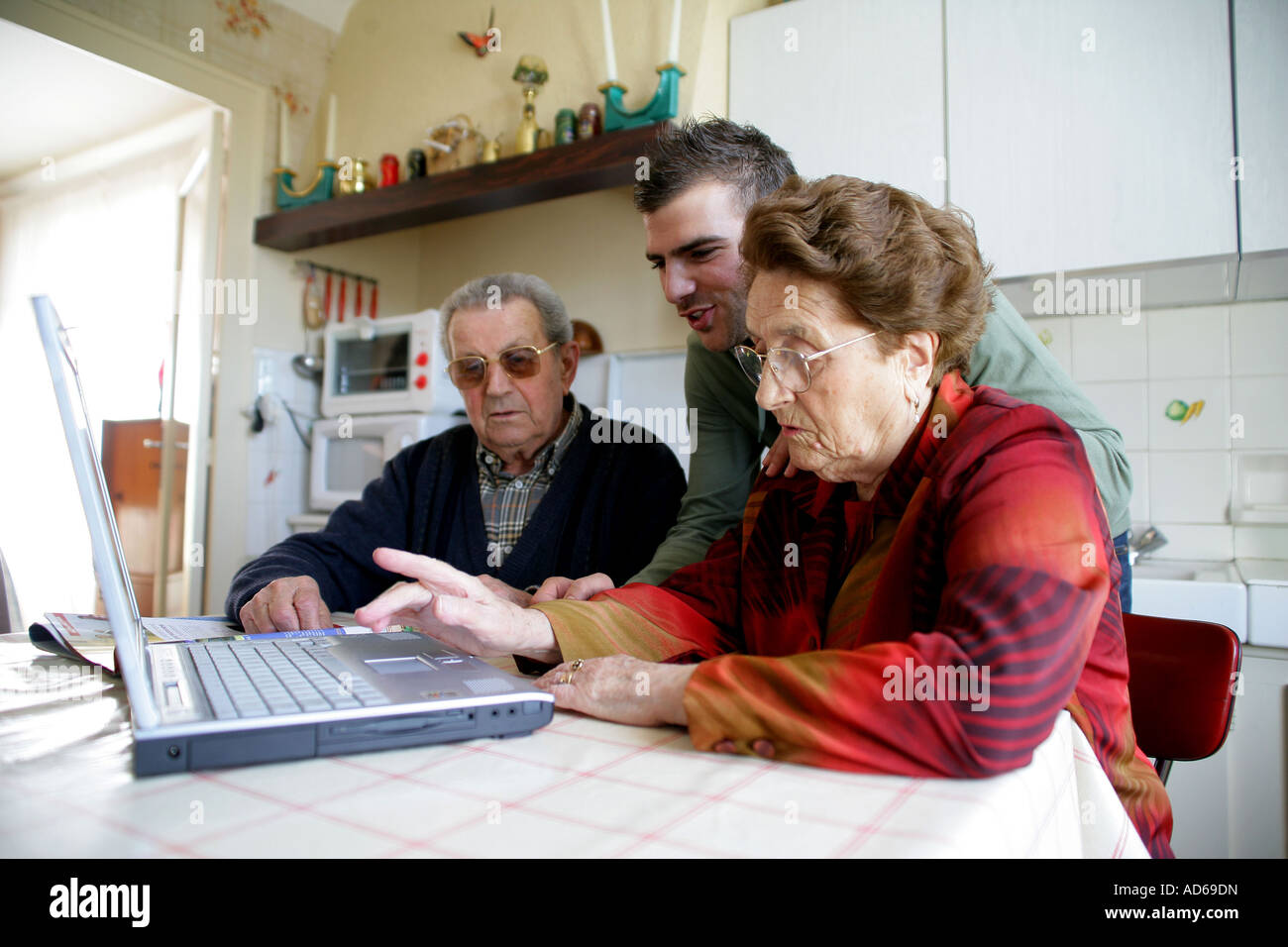 elderly people with laptop computer Stock Photo - Alamy