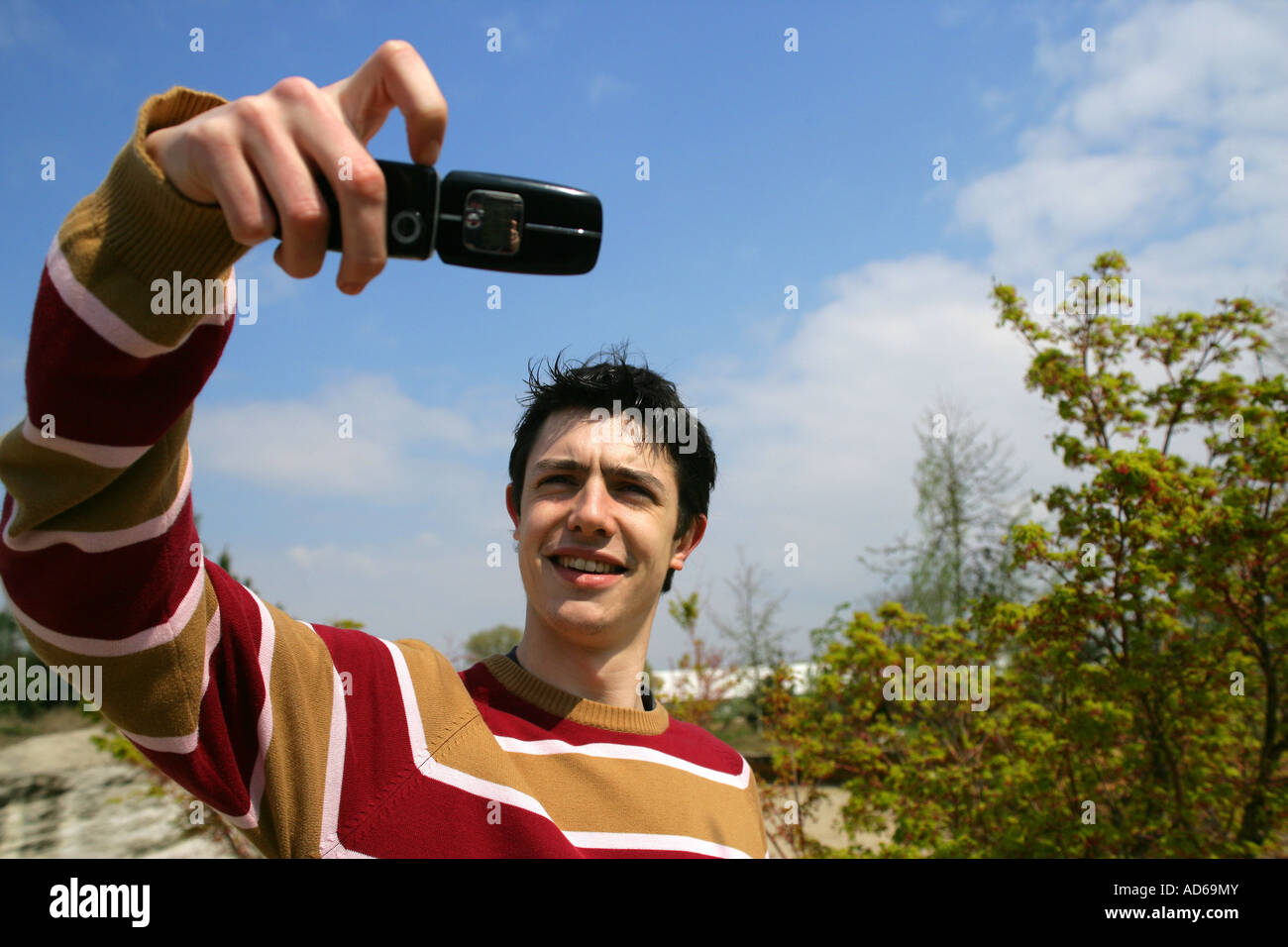 young boy with mobile phone Stock Photo - Alamy