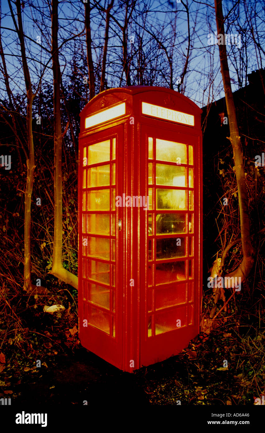British red telephone box at night Stock Photo - Alamy