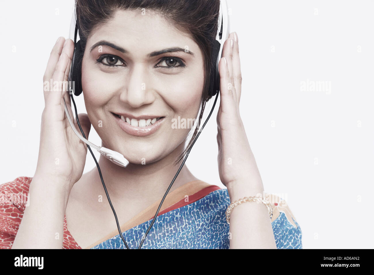 Indian woman portrait sari headset hi-res stock photography and images ...