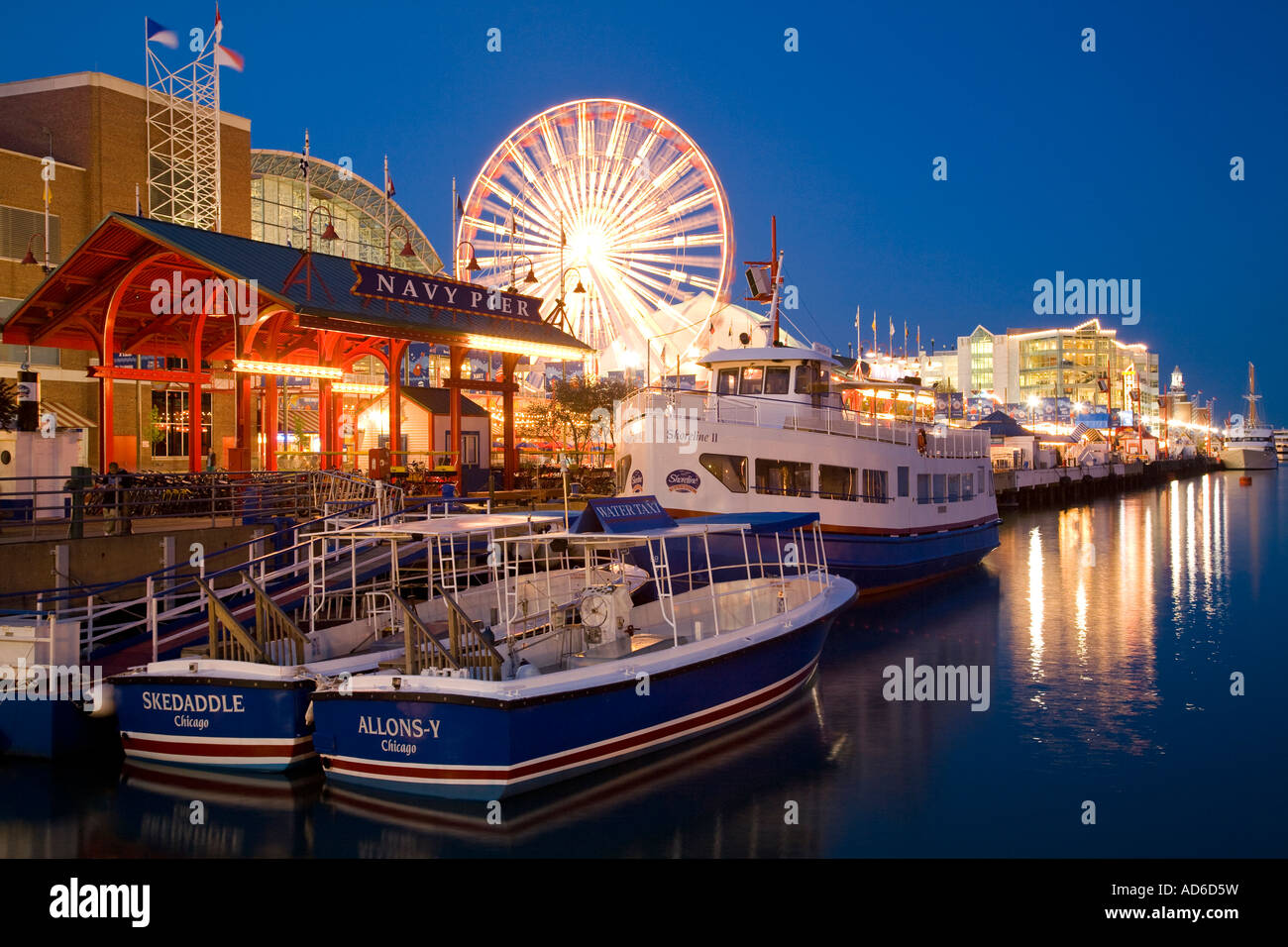CHICAGO Illinois Water taxis and boats docked at Navy Pier Ferris wheel ...