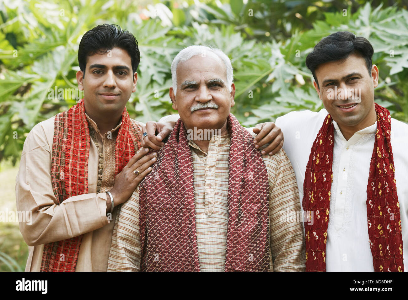 Father three sons on back hi-res stock photography and images - Alamy