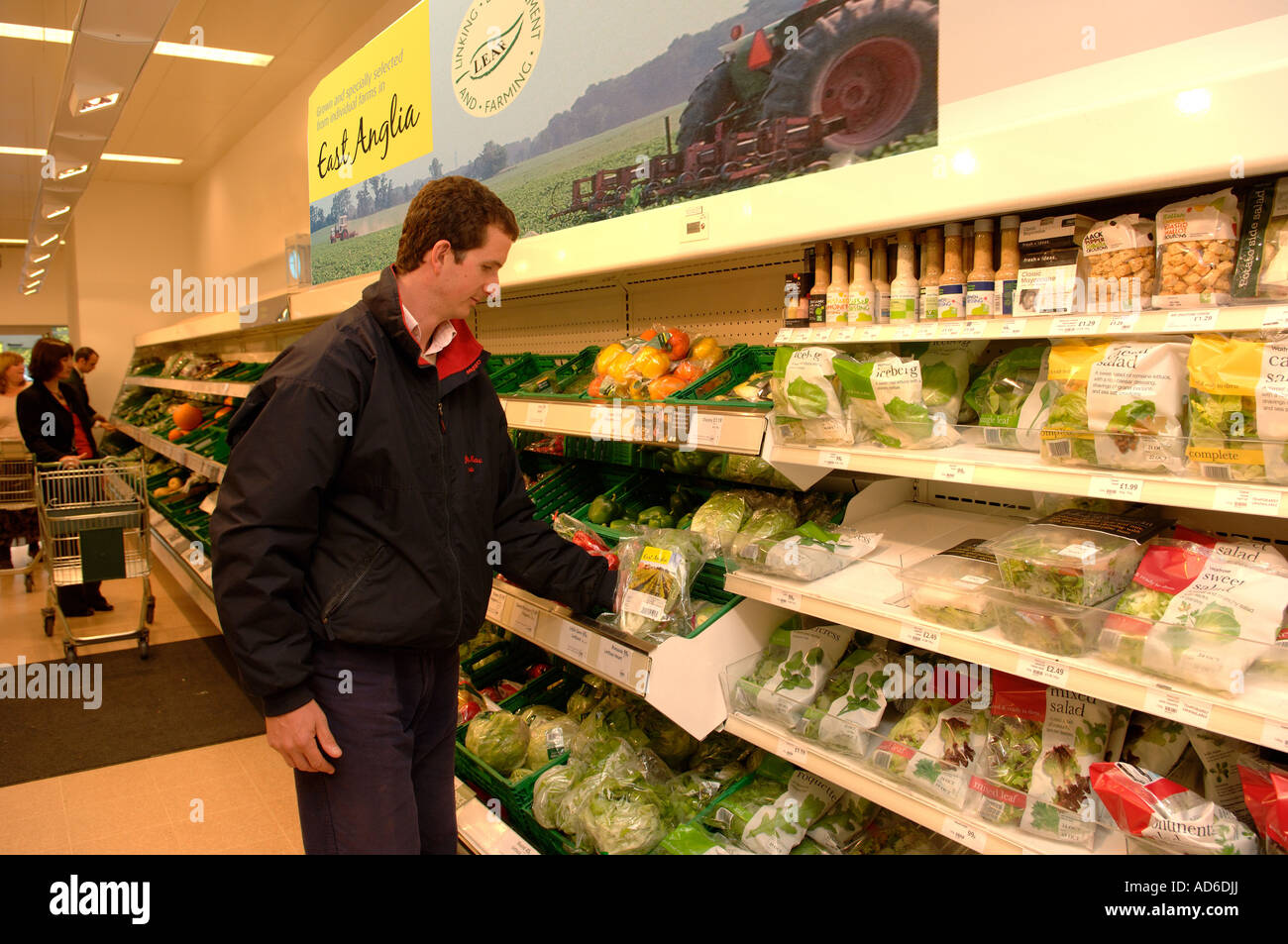 Purchasing English salad produce in supermarket Stock Photo - Alamy