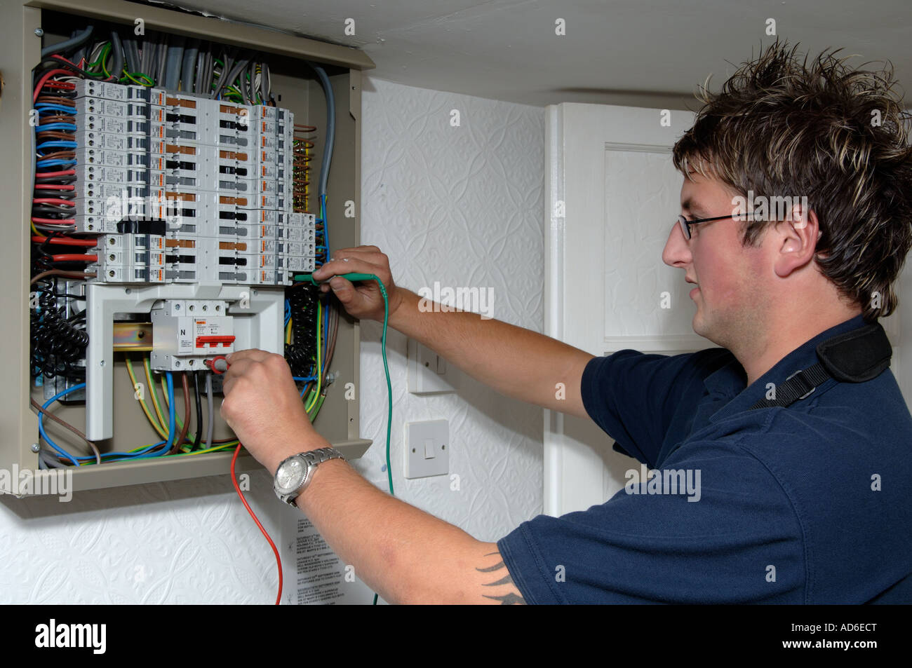 Electrician at work UK Stock Photo - Alamy