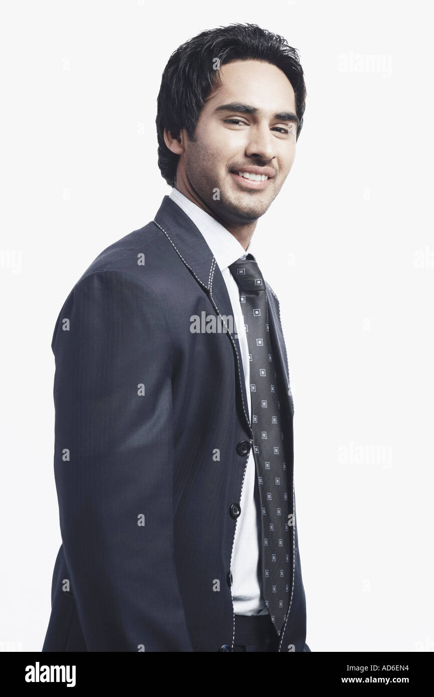 Side profile of a businessman smiling Stock Photo - Alamy