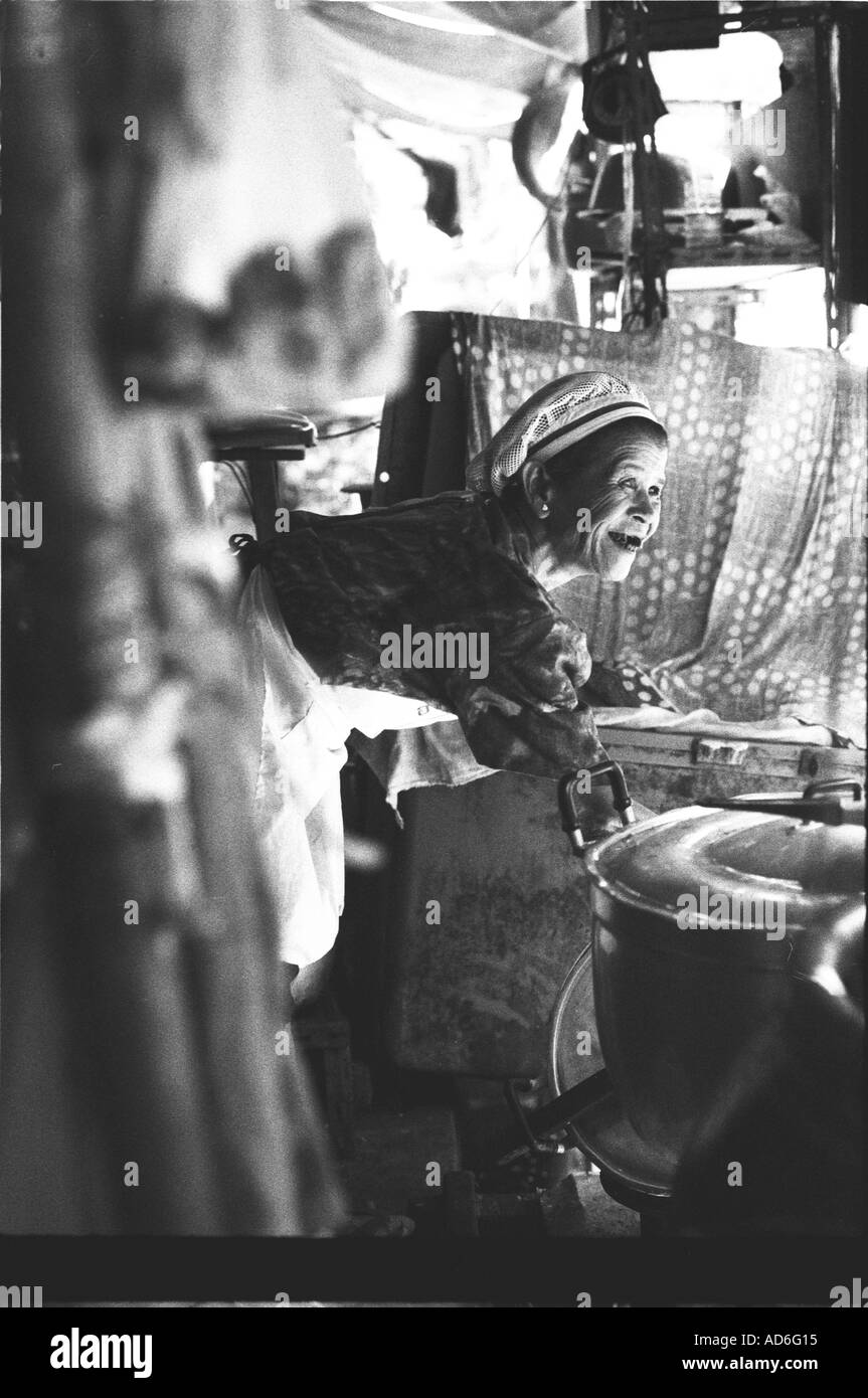 Lady serving food Black and White Stock Photos & Images - Alamy
