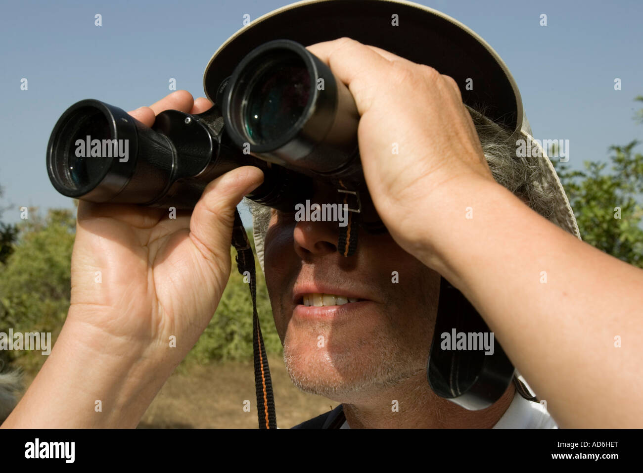 Birdwatcher binoculars hat hi-res stock photography and images - Alamy