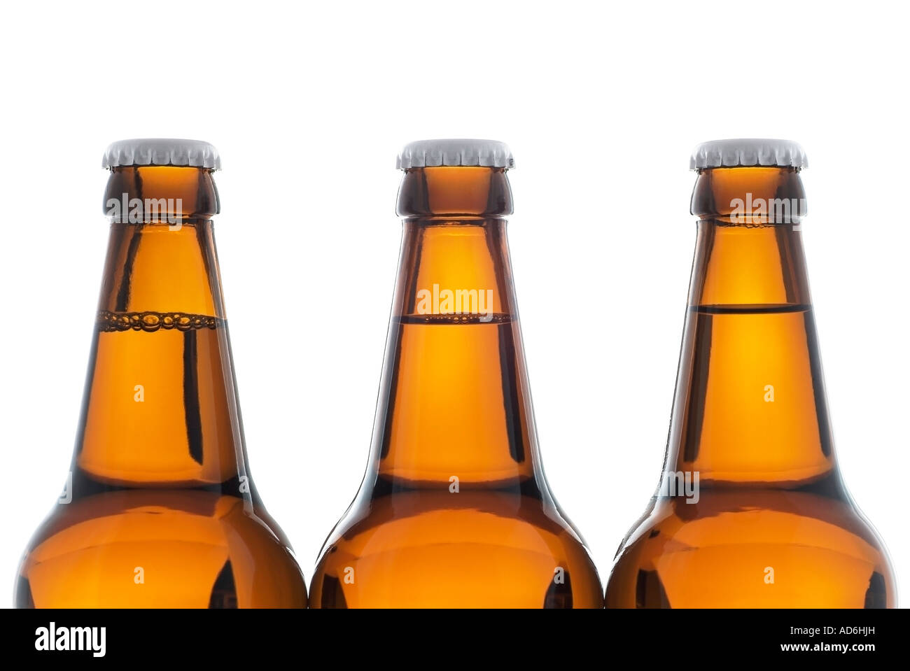 Beer Bottles in a Line High Section View Stock Photo - Alamy