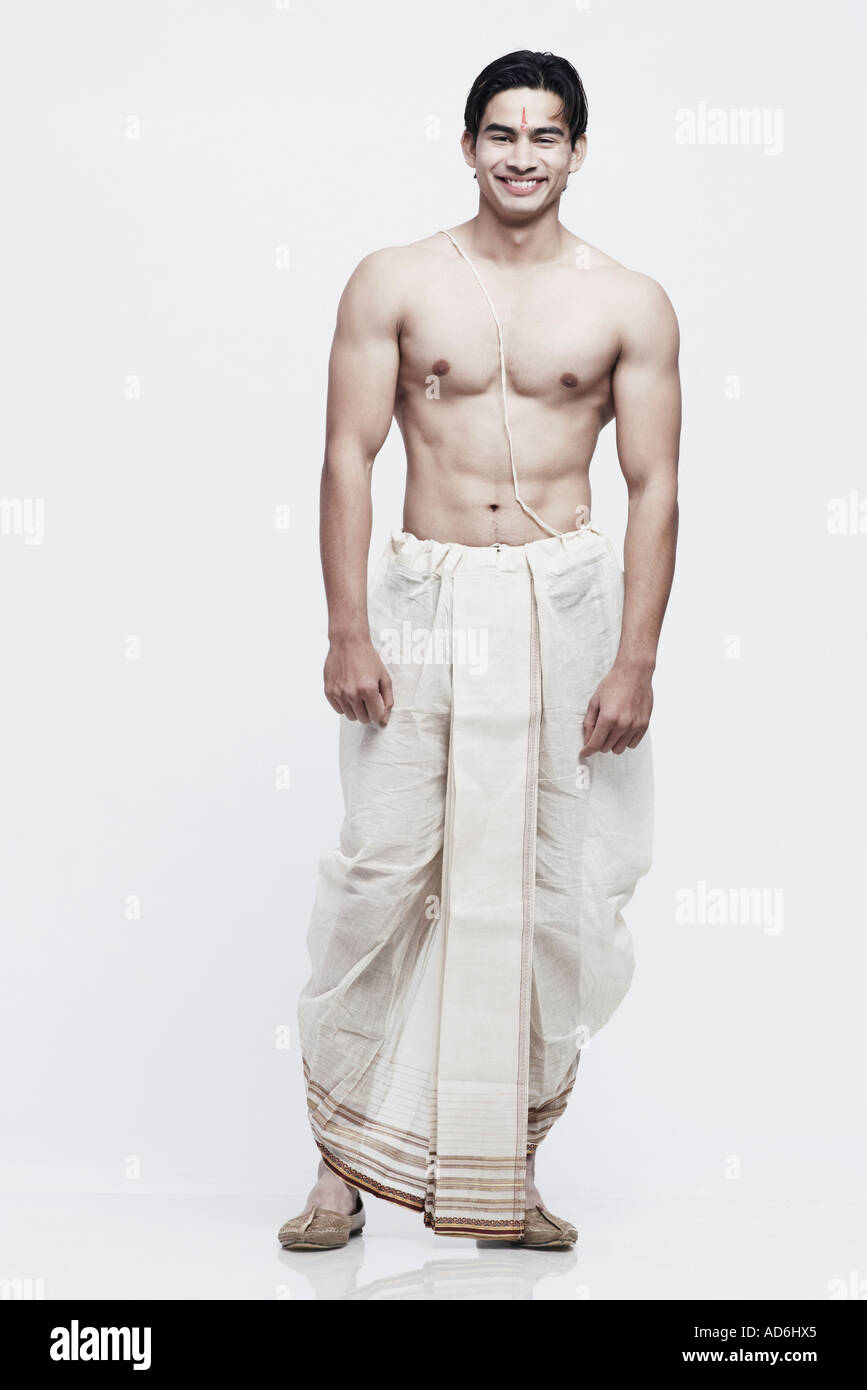 Portrait of a young man in traditional clothing Stock Photo - Alamy