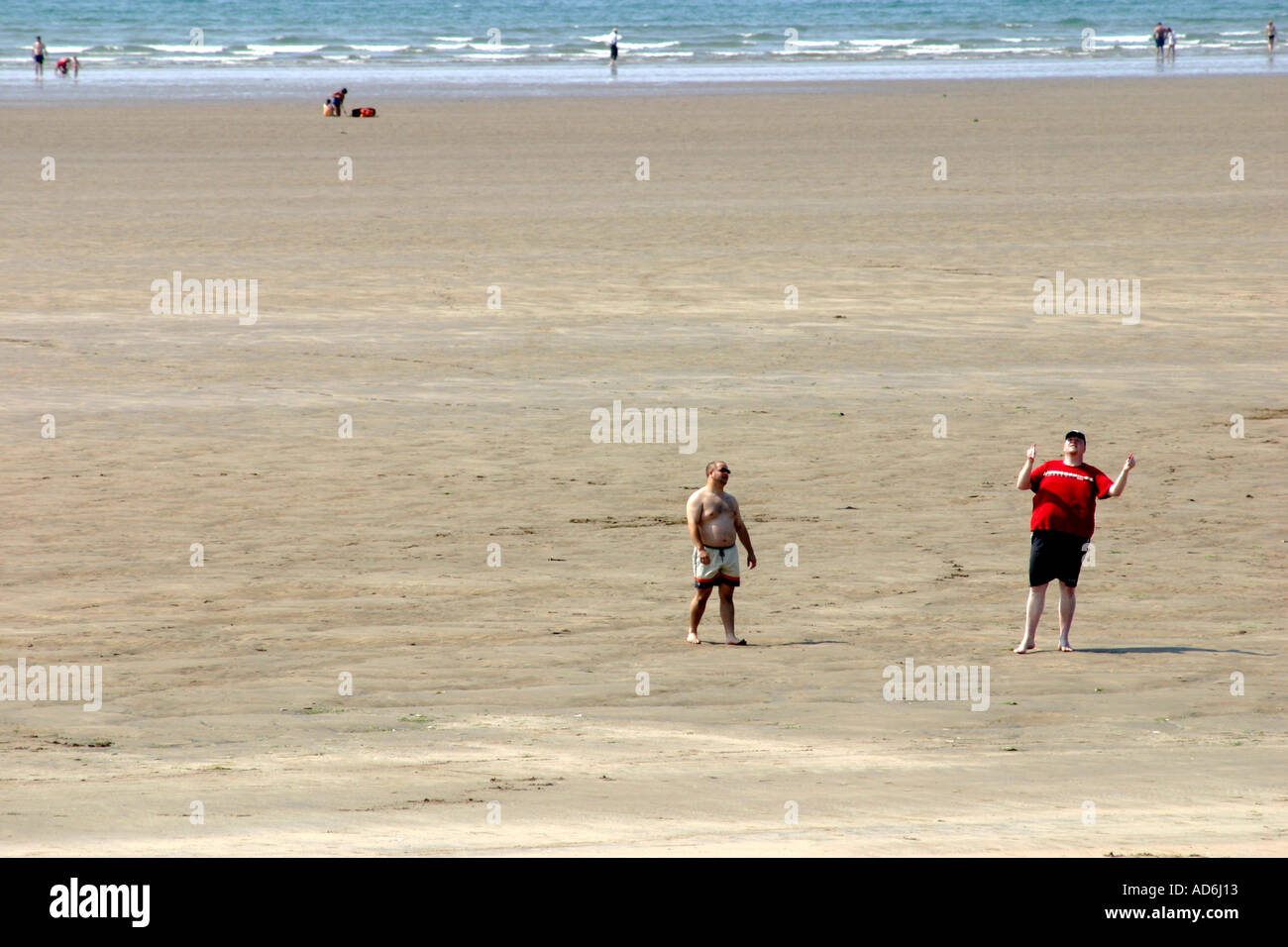 Fat men beach hi-res stock photography and images - Alamy